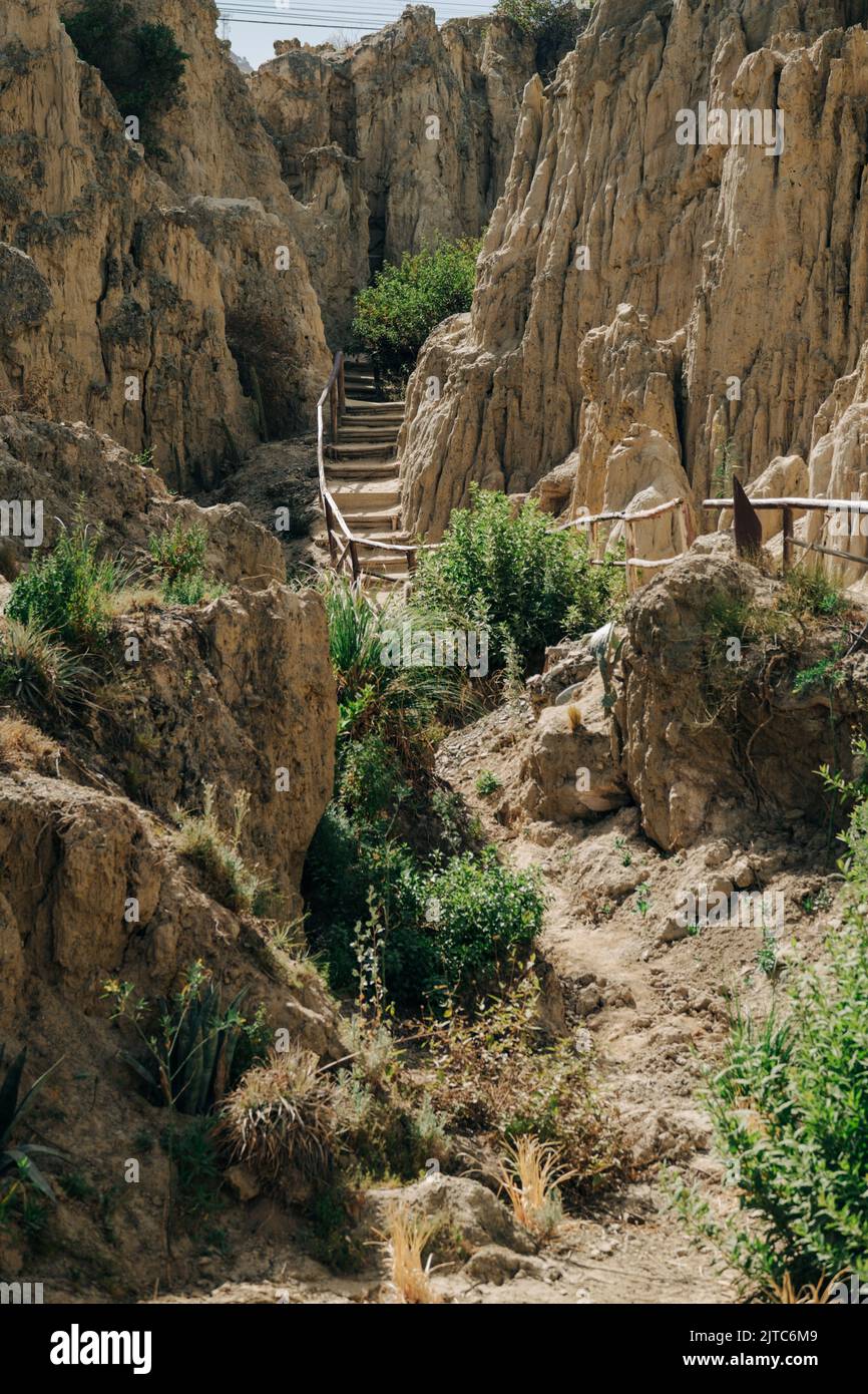 A stone stair path passing through a mountain Stock Photo - Alamy