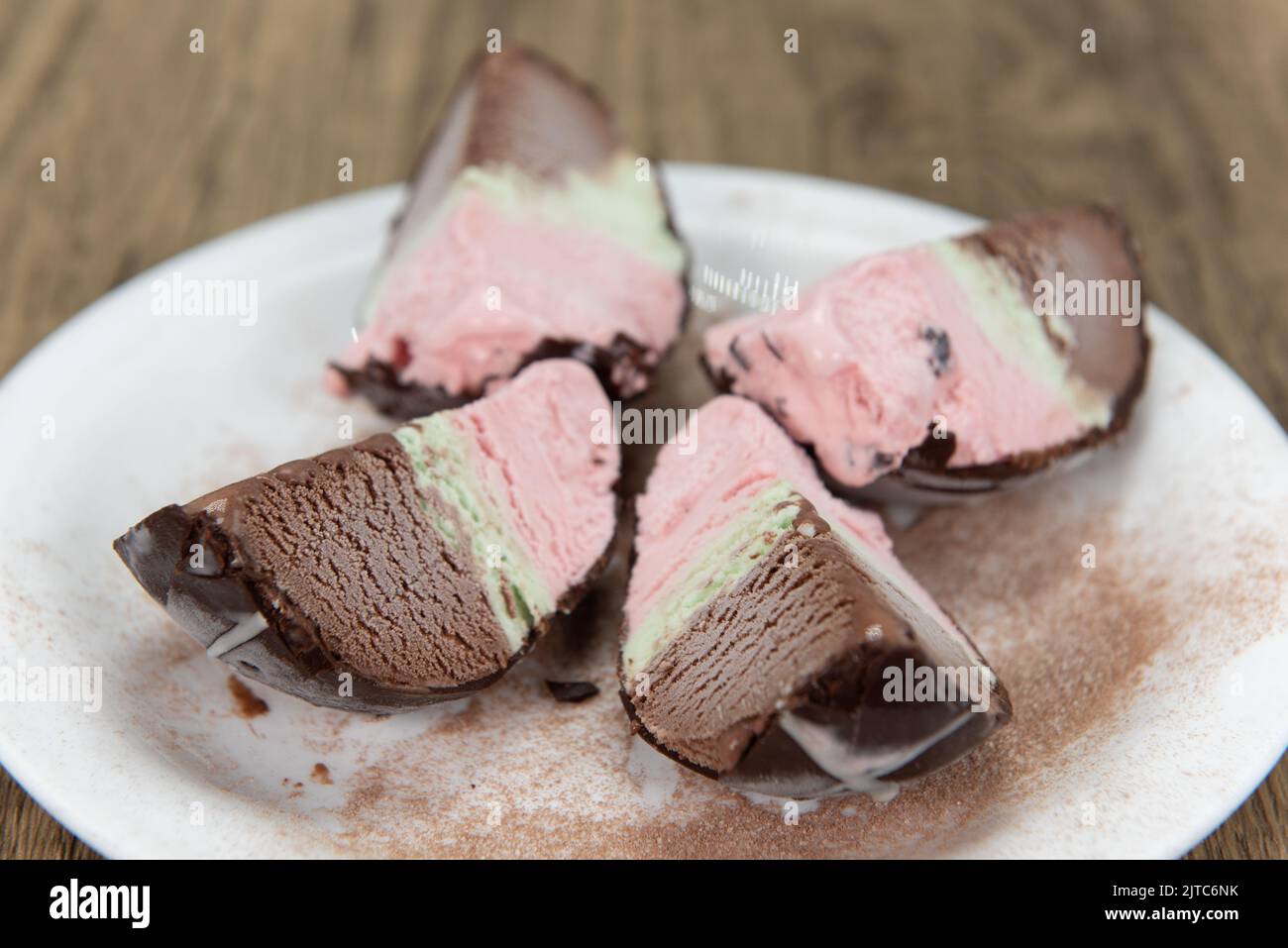 Authentic Italian cuisine dessert of spumoni cut into quarters and ...