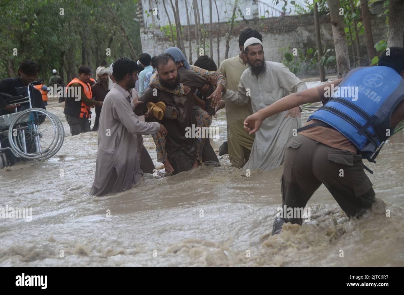 Peshawar, Pakistan. 26th Aug, 2022. Torrential rains and storms cause ...