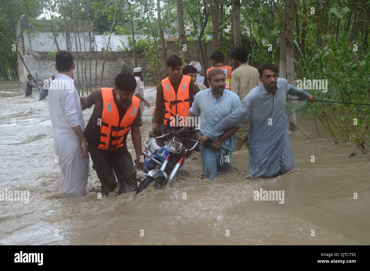 Peshawar, Pakistan. 26th Aug, 2022. Torrential rains and storms cause ...