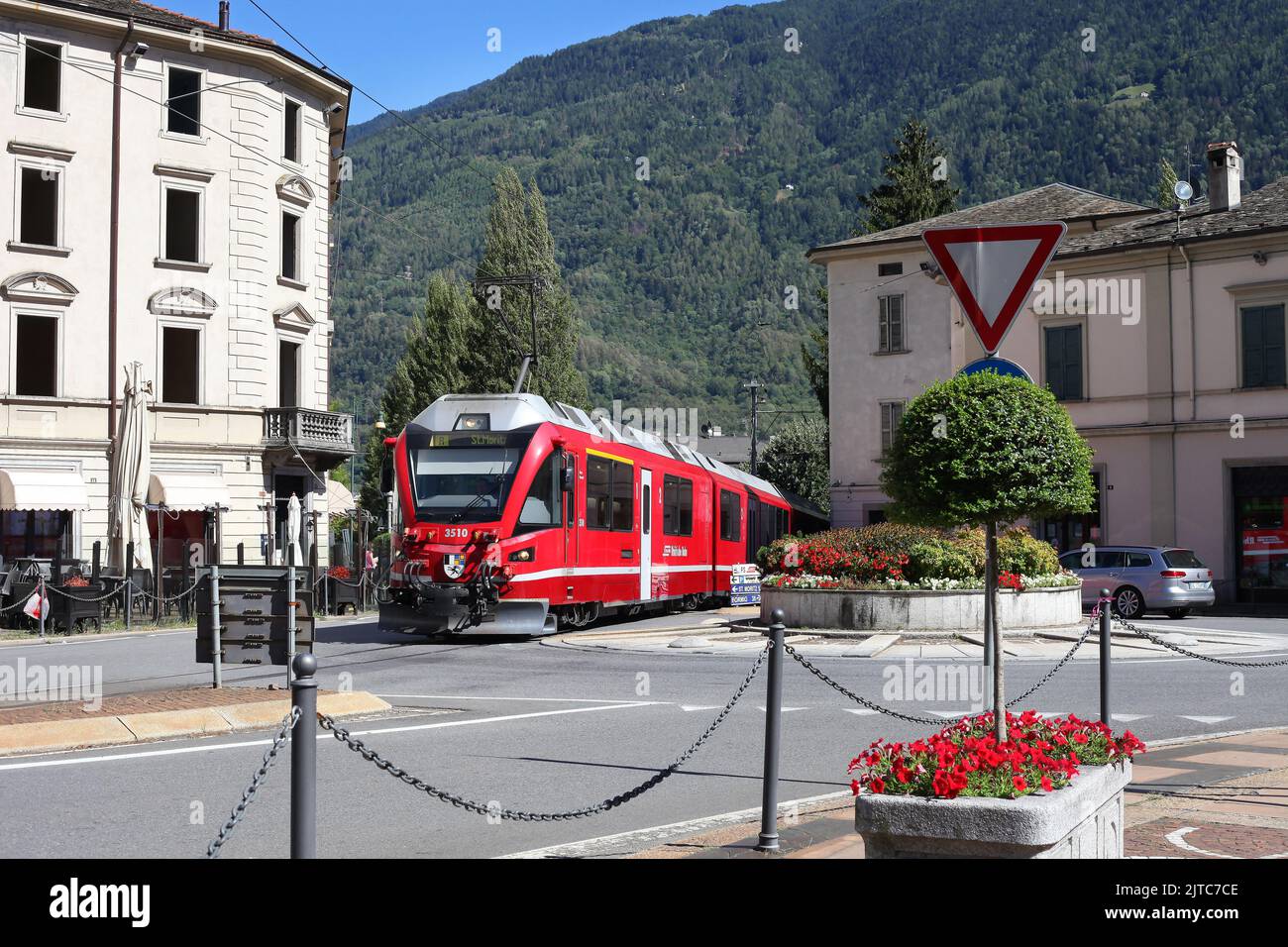 Rhaetian Railway 3510 heads away from Tirano and over a roundabout on ...