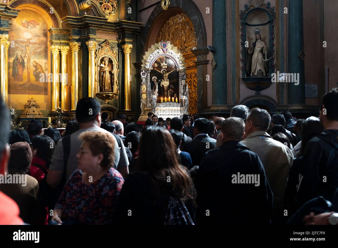 Lord of the Miracles devouts attending a Mass at Las Nazarenas church ...