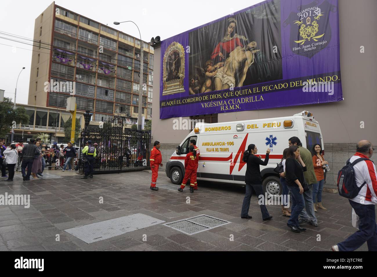 Ambulance, firefighters and paramedics in front of Las Nazarenas church ...