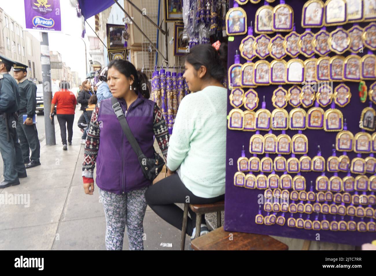 Two women selling religious articles in front of the Lord of the ...