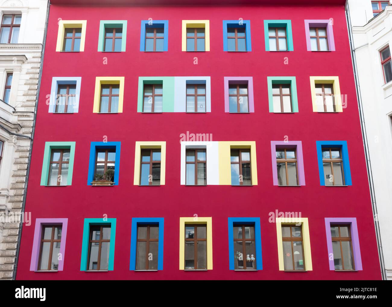 A colored facade of an apartment building Stock Photo - Alamy
