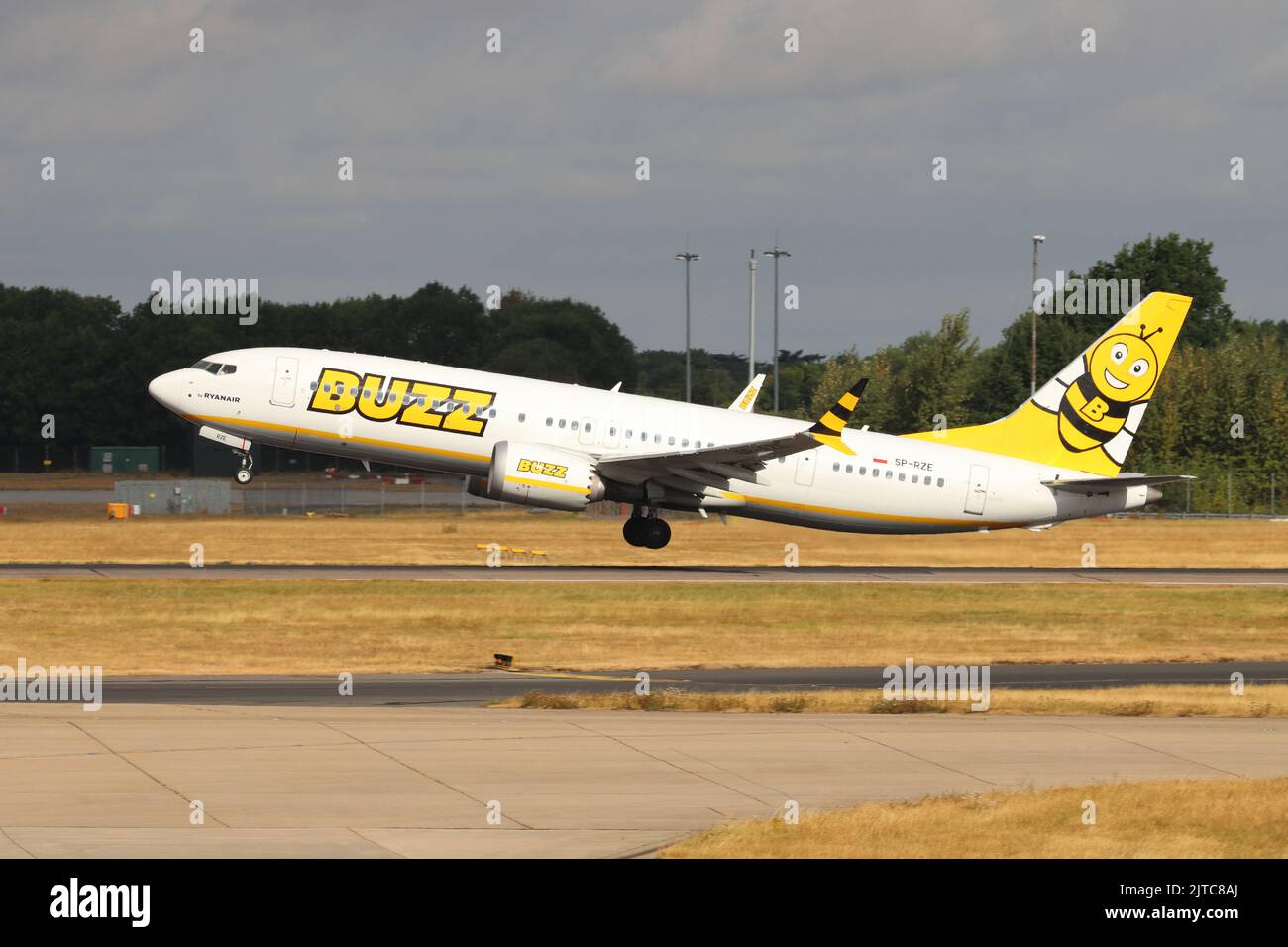Buzz Air, Boeing 737 SP-RZA, departing London Stansted Airport, Essex ...