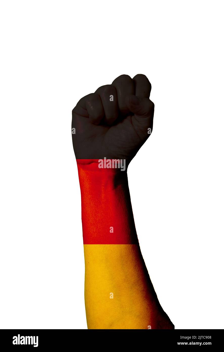 A flag of Germany painted on a human raised fist- the concept of power ...