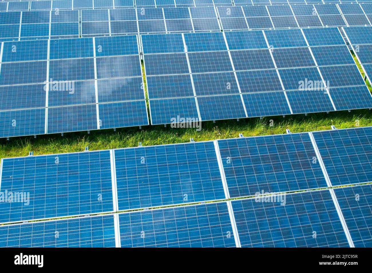 Solar panels in the green field for generation of green energy safety ...