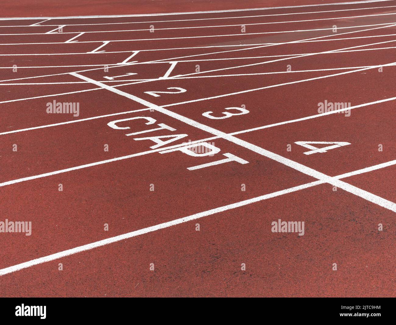 Red treadmill at the stadium with white lines Stock Photo - Alamy