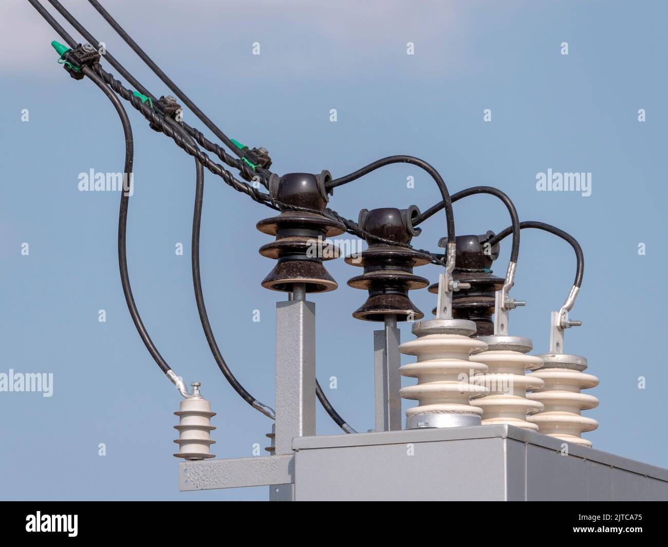 Electric transformer with wires and an insulator against the sky Stock ...