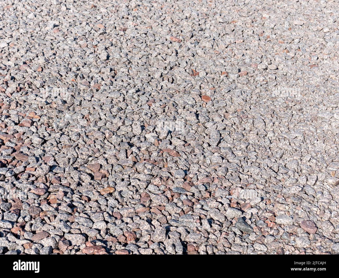 Crushed rubble and pebbles a background texture Stock Photo - Alamy