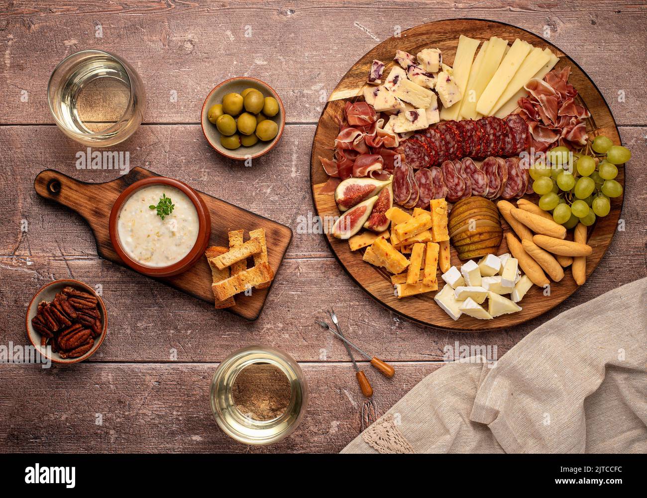 Food photography of antipasto, hummus, pecan, cheese, cheddar, brie ...