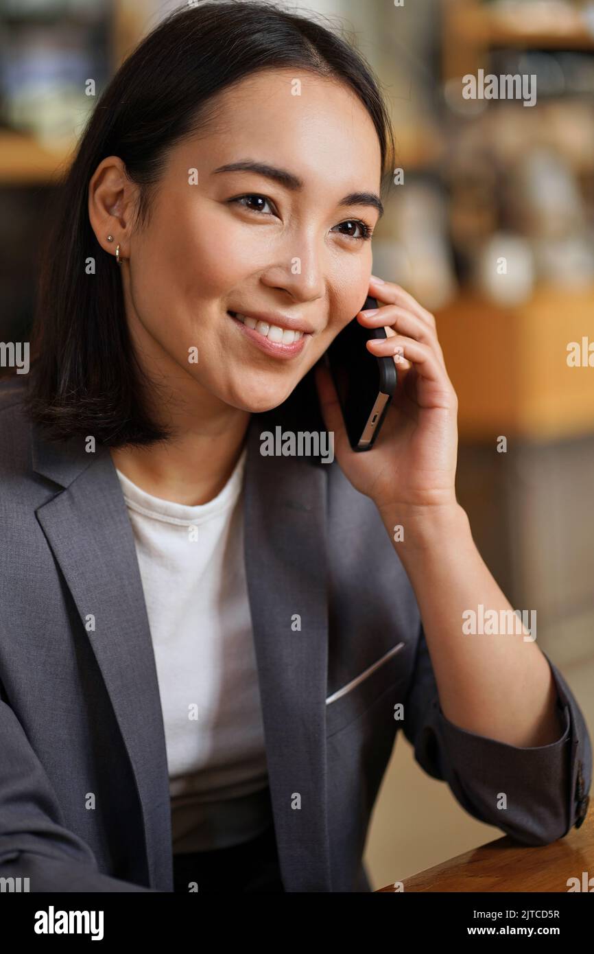 Talking on cell hi-res stock photography and images - Alamy