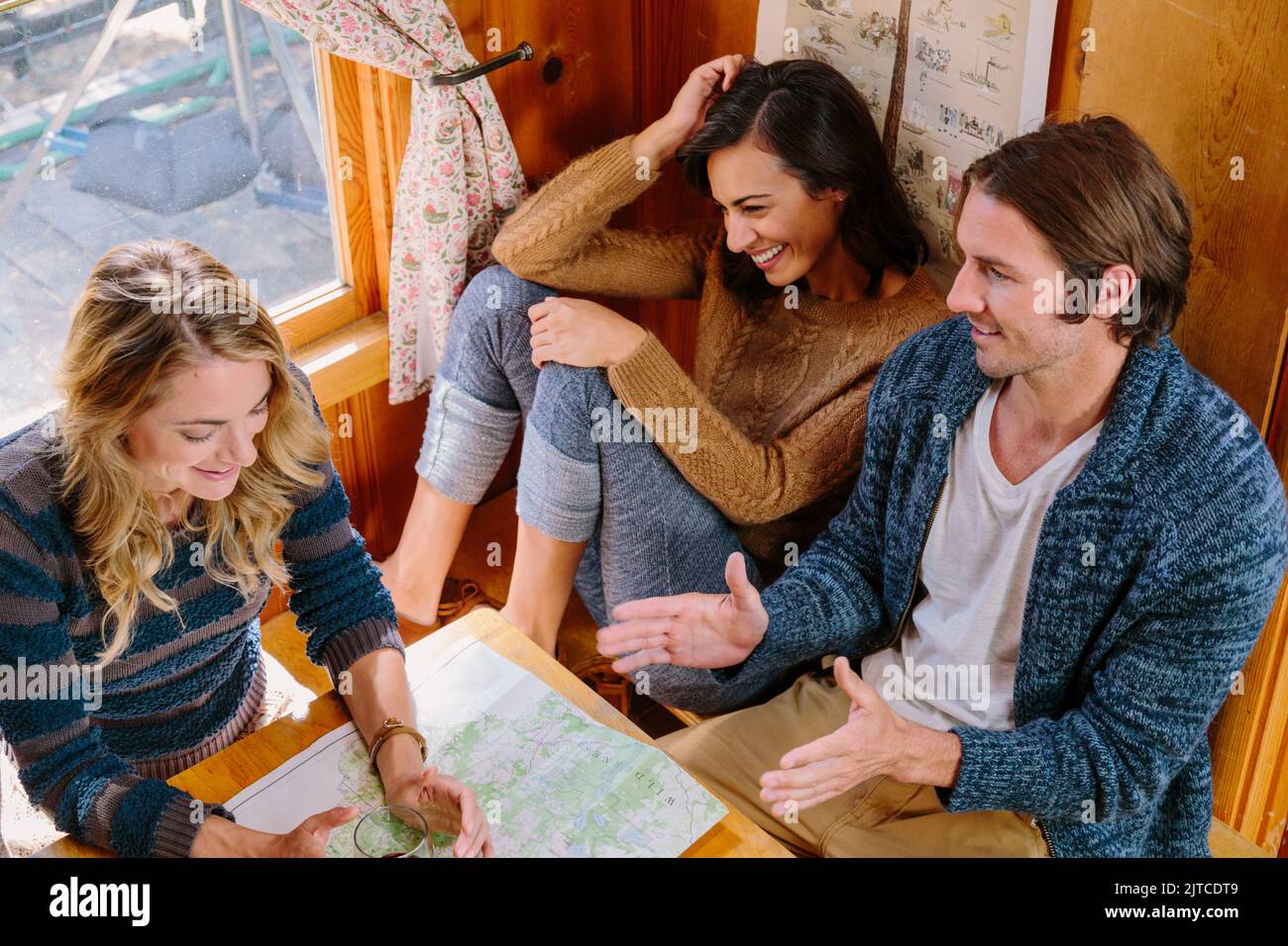 Friends planning for a hike Stock Photo - Alamy