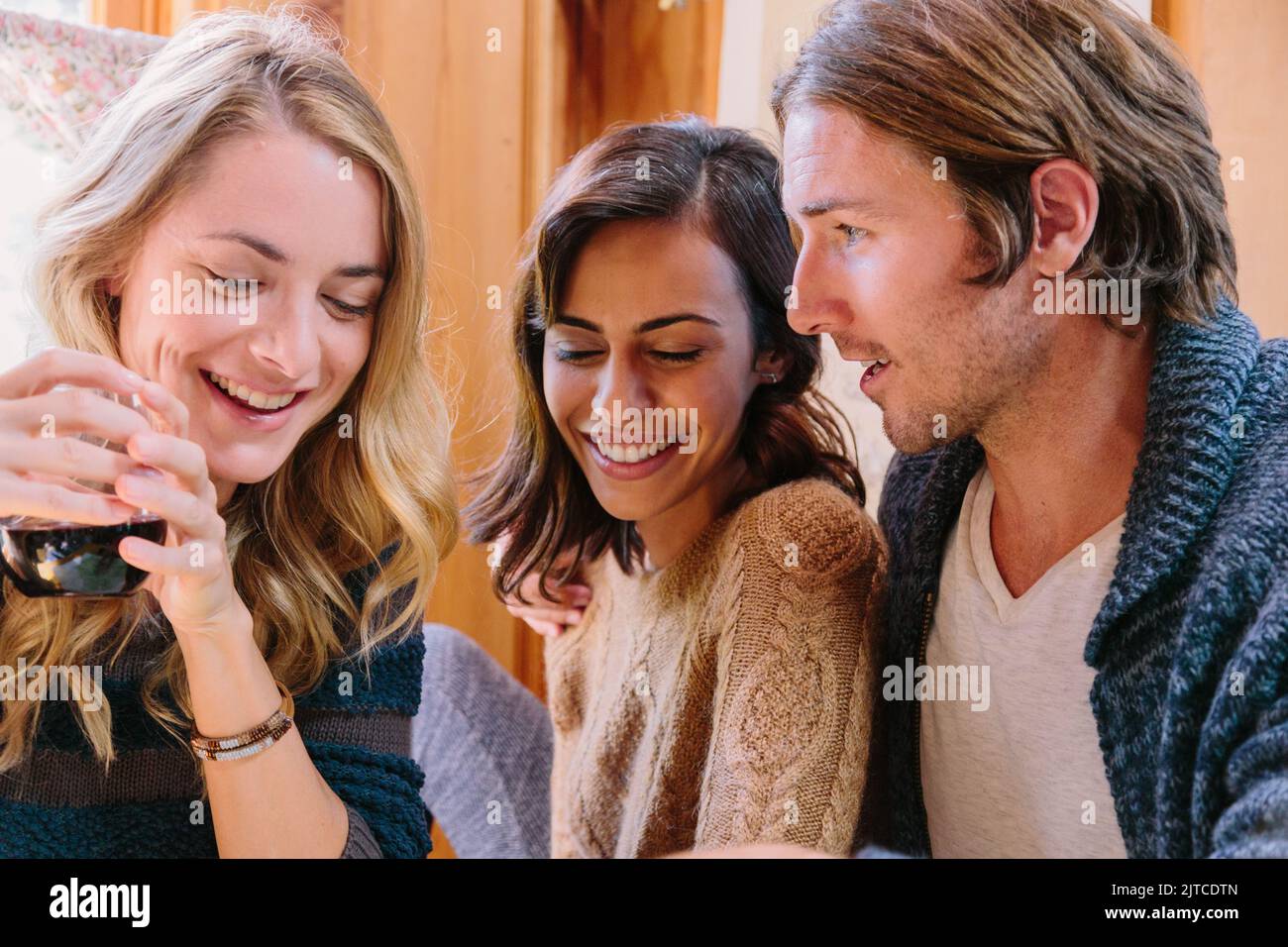 Friends laughing together hi-res stock photography and images - Alamy