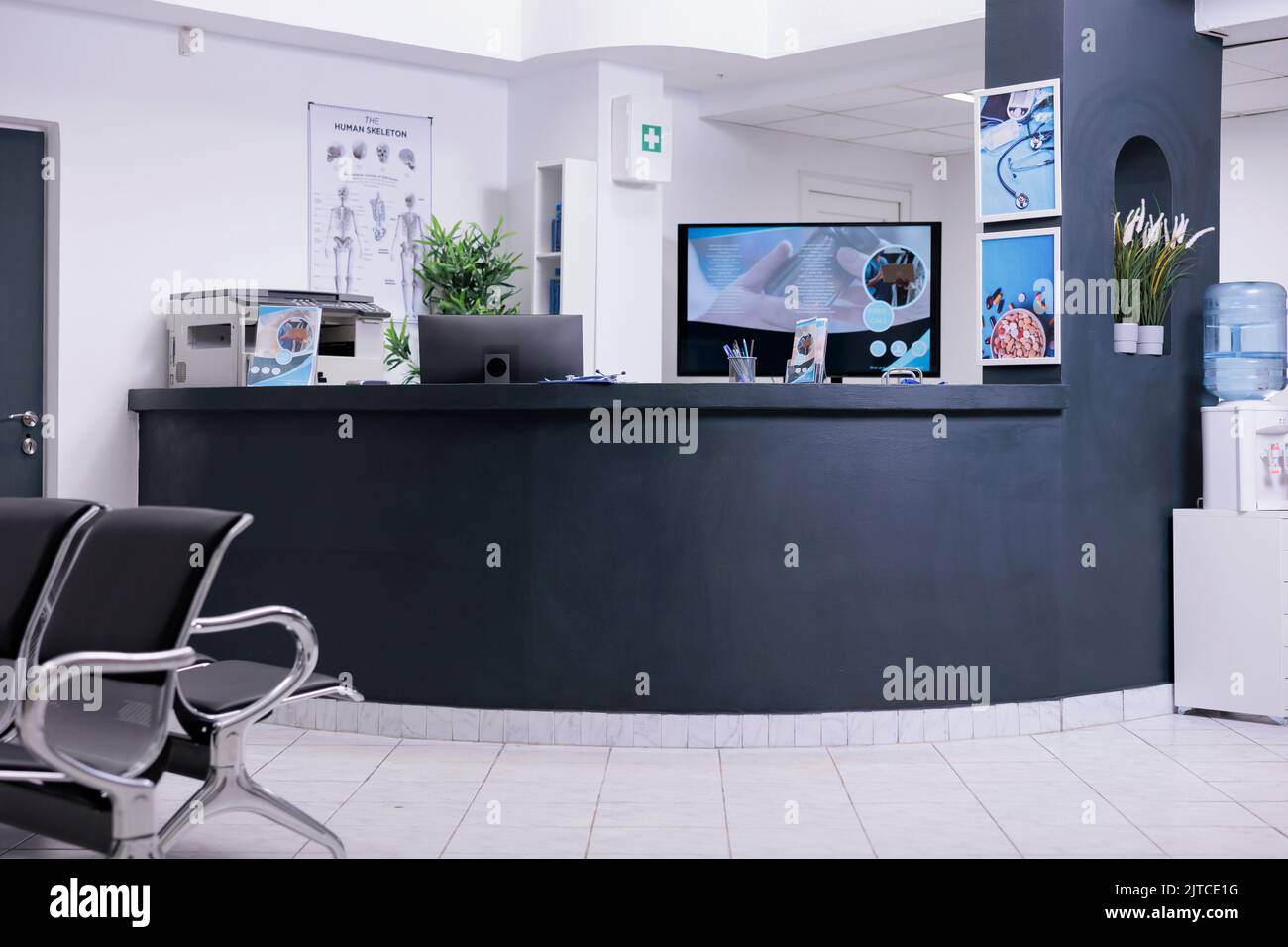 Facility registration counter in waiting area lobby, computer to make ...