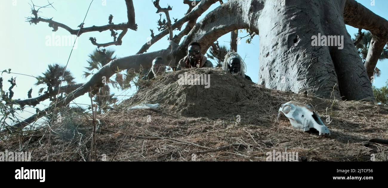 SALOUM, from left: Roger Sallah, Yann Gael, Mentor Ba, 2021. © Shudder ...