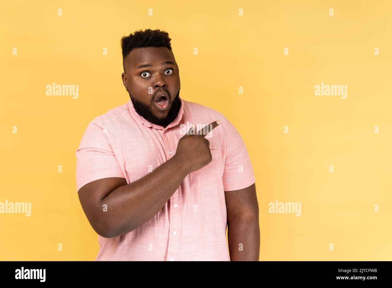 Astonished guy showing surprise hi-res stock photography and images - Alamy