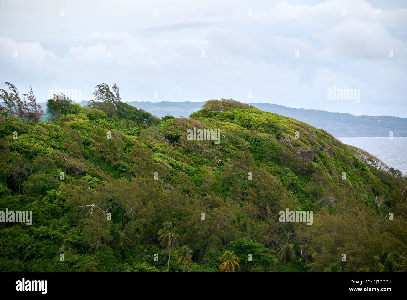 A beautiful view of a hill with a cloudy sky background Stock Photo - Alamy