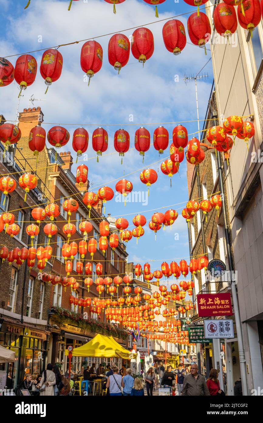 Colourful red and gold Chinese lanterns strung across Lisle Street in ...