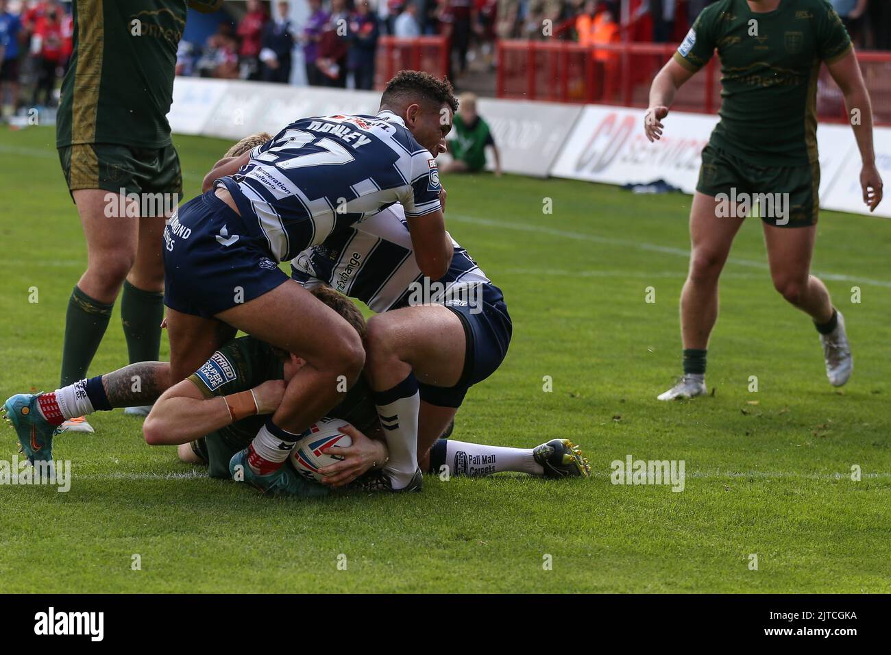Ethan Ryan #23 of Hull KR dives low to score his second try of the ...