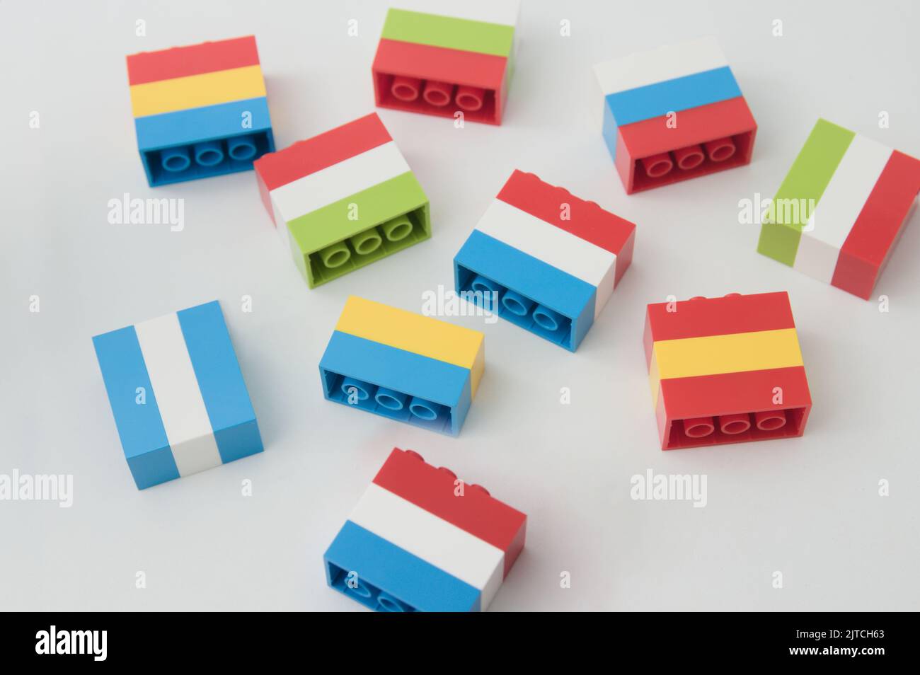 Image of some colored blocks on white that recreate the national flags ...