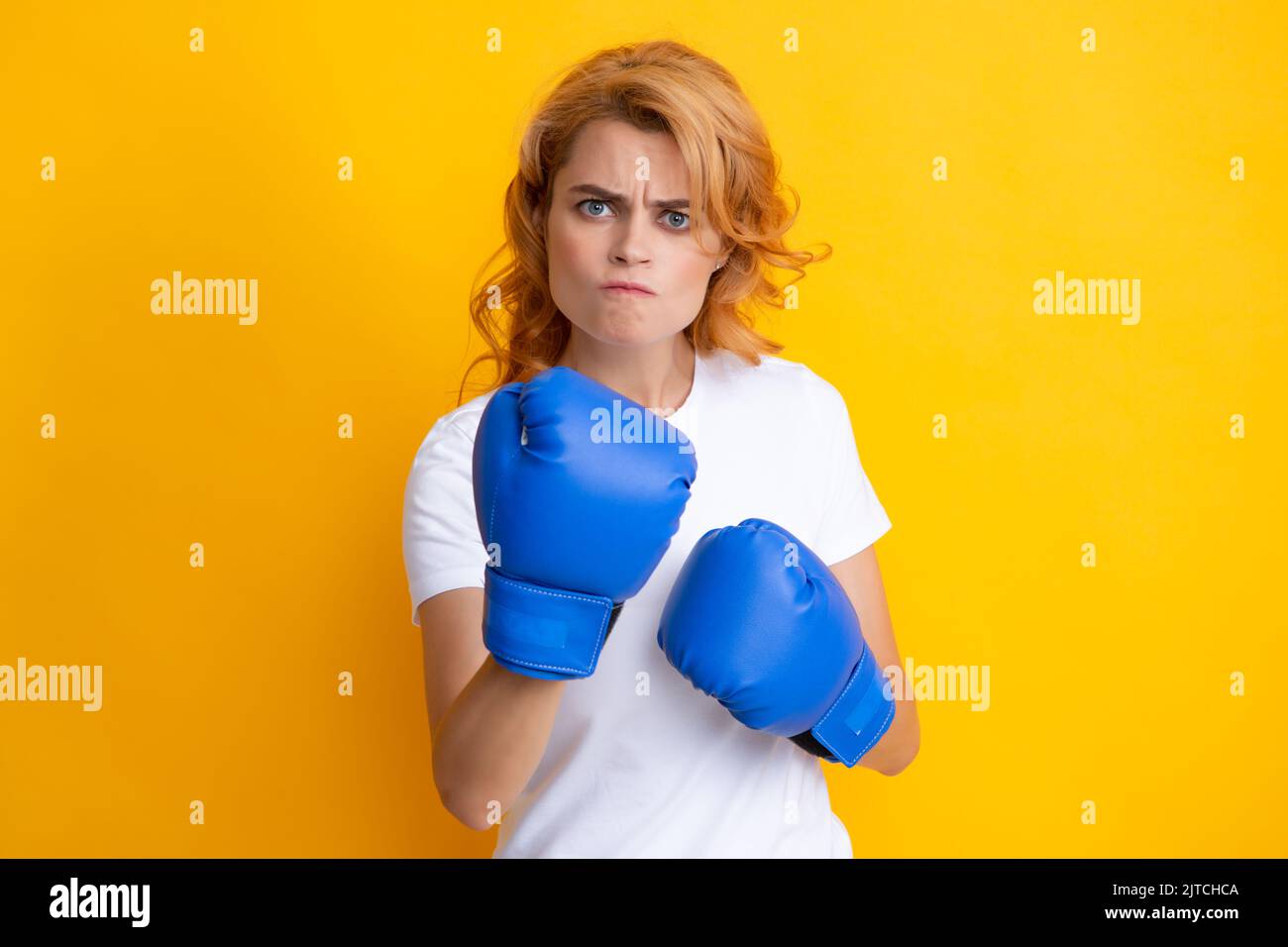 Angry woman in boxing gloves. Winning success power woman concept Stock ...