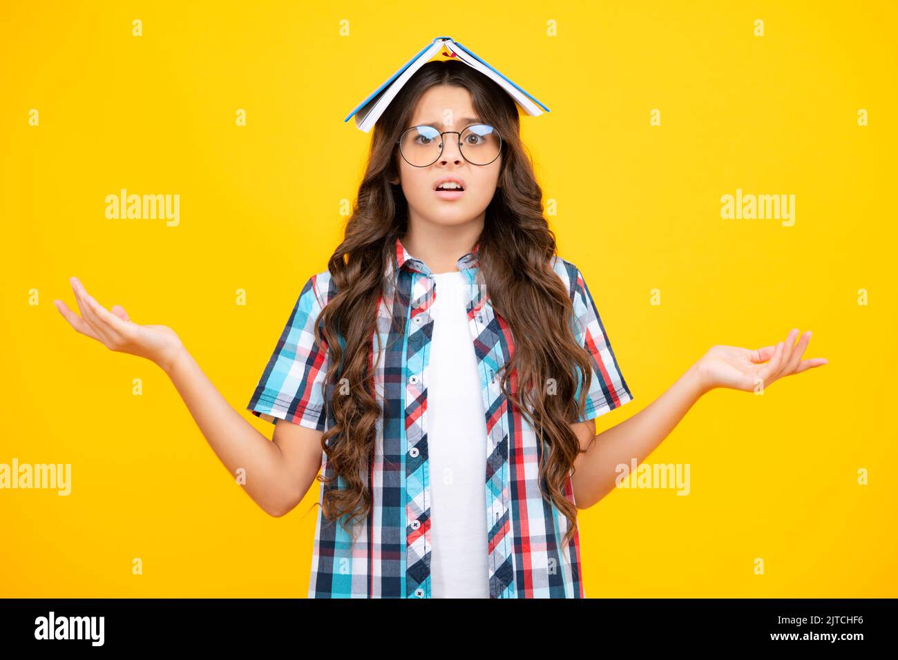 Teenage school girl with books. Schoolgirl student. Shocked surprised ...