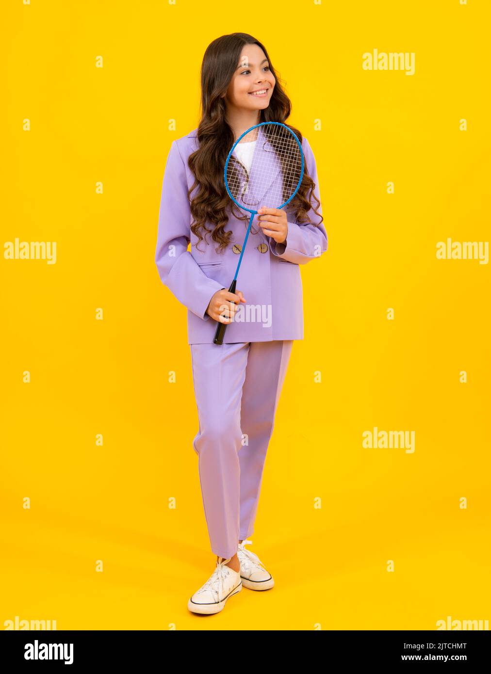 Teen girl badminton player in suit with badminton racket isolated on ...