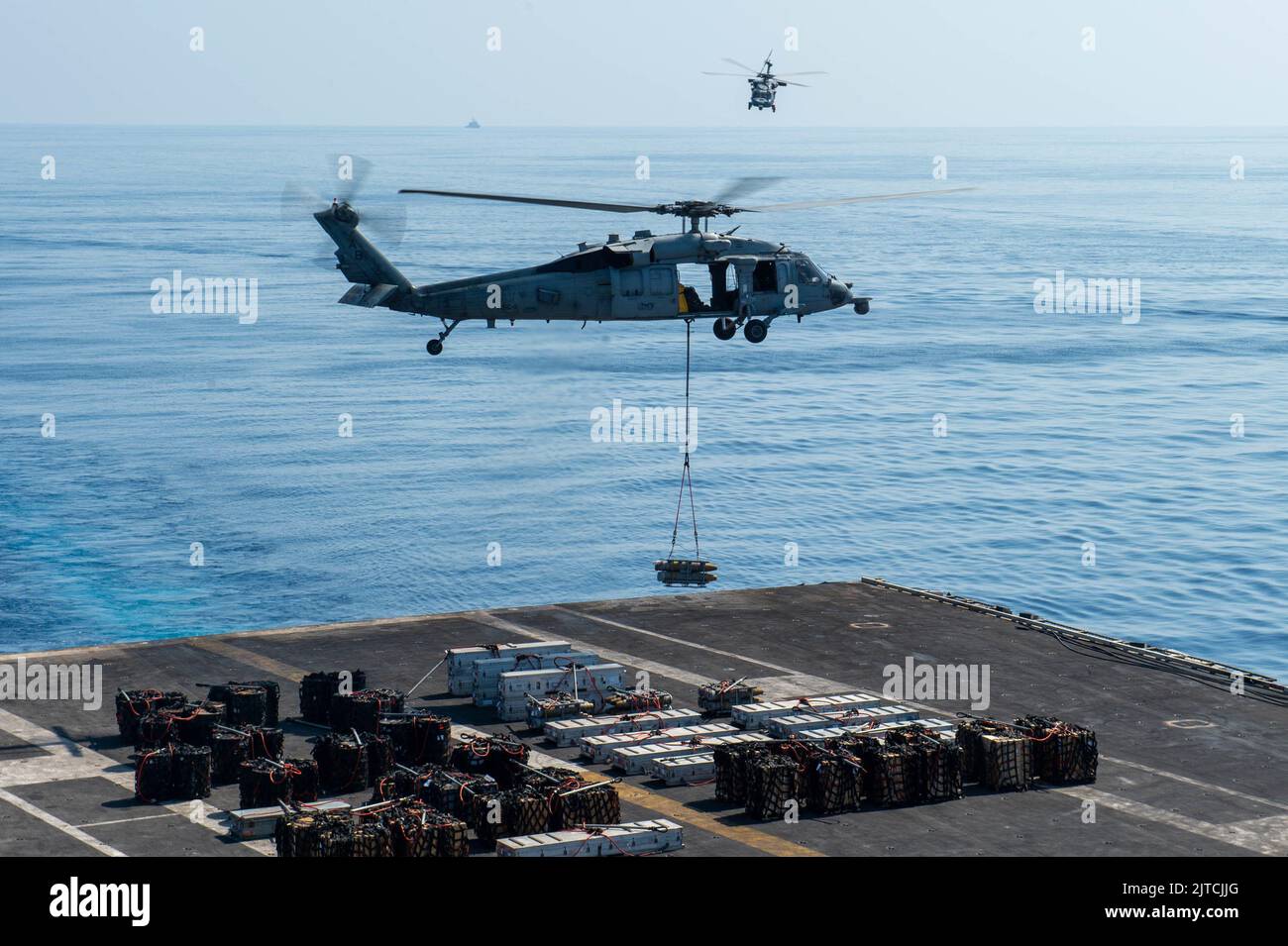 220827-N-CY569-1222 V SEA (Aug. 27, 2022) Two MH-60S Sea Hawk ...