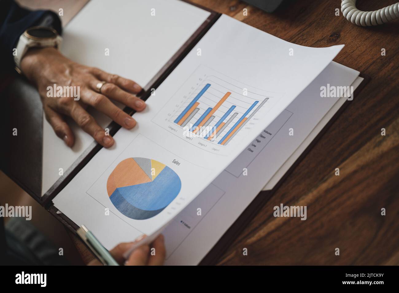 Reviewing charts hi-res stock photography and images - Alamy
