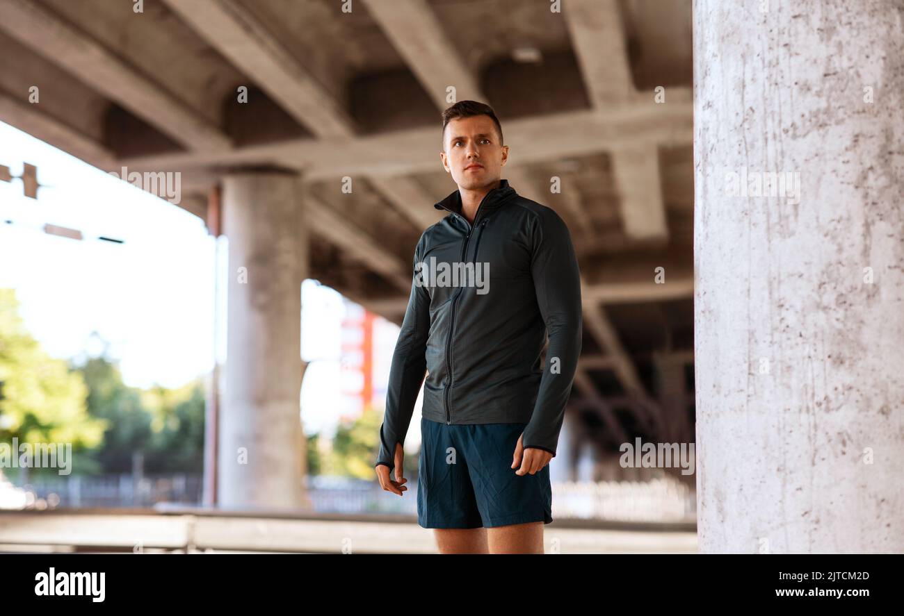 sportsman under bridge Stock Photo - Alamy