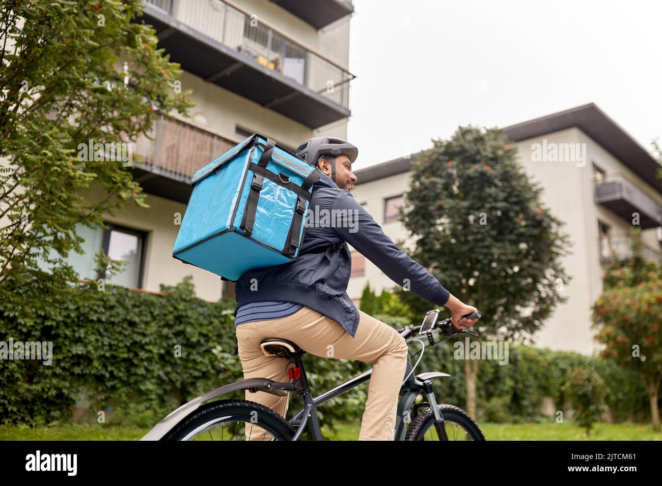 Indian bike delivery boy hi-res stock photography and images - Alamy