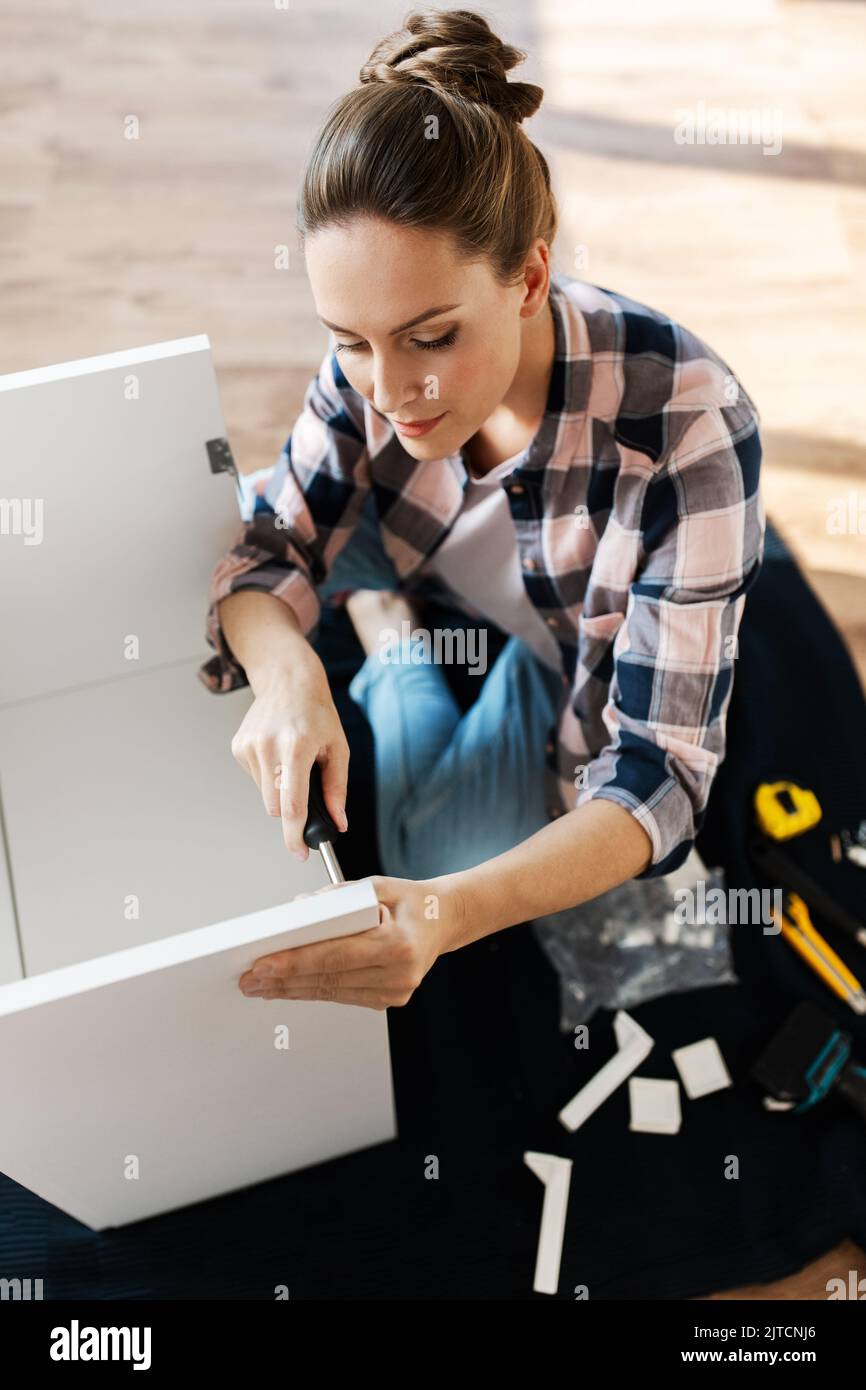 Woman assembling hi-res stock photography and images - Alamy