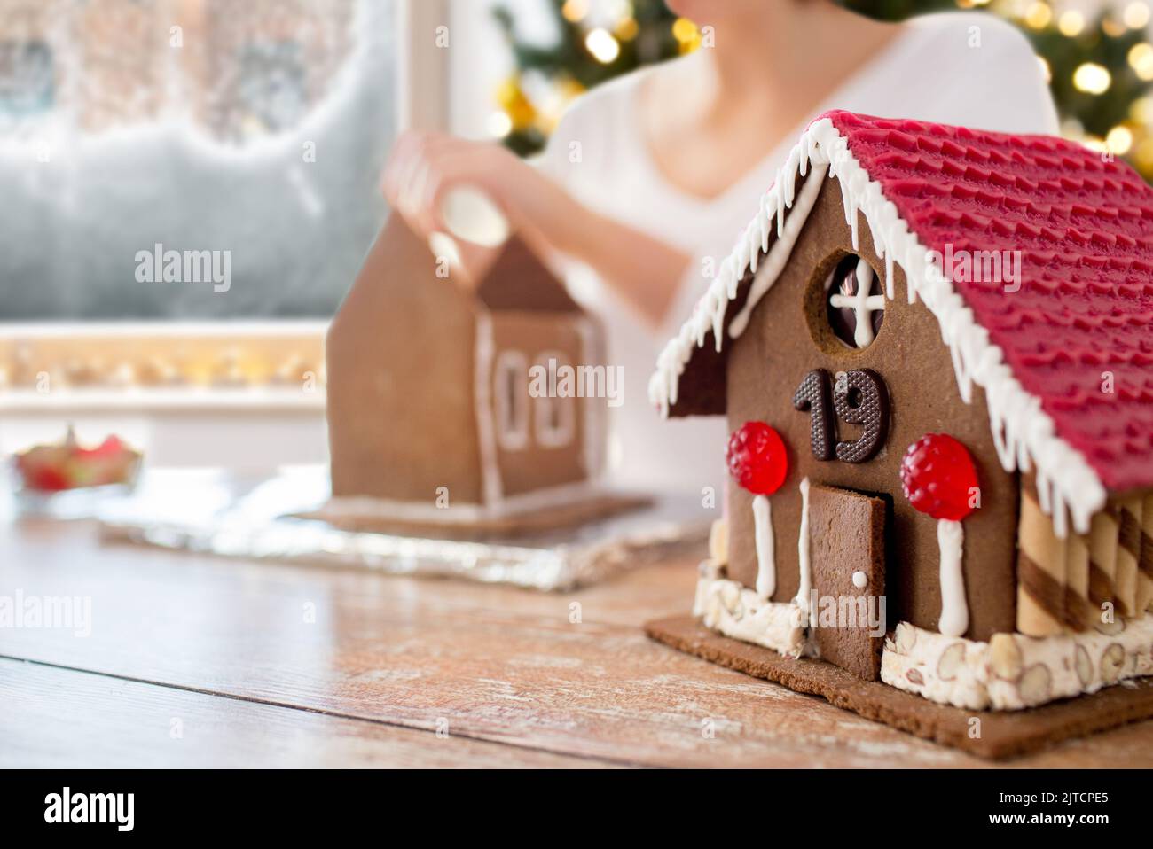 Woman glazing traditional gingerbread hi-res stock photography and ...