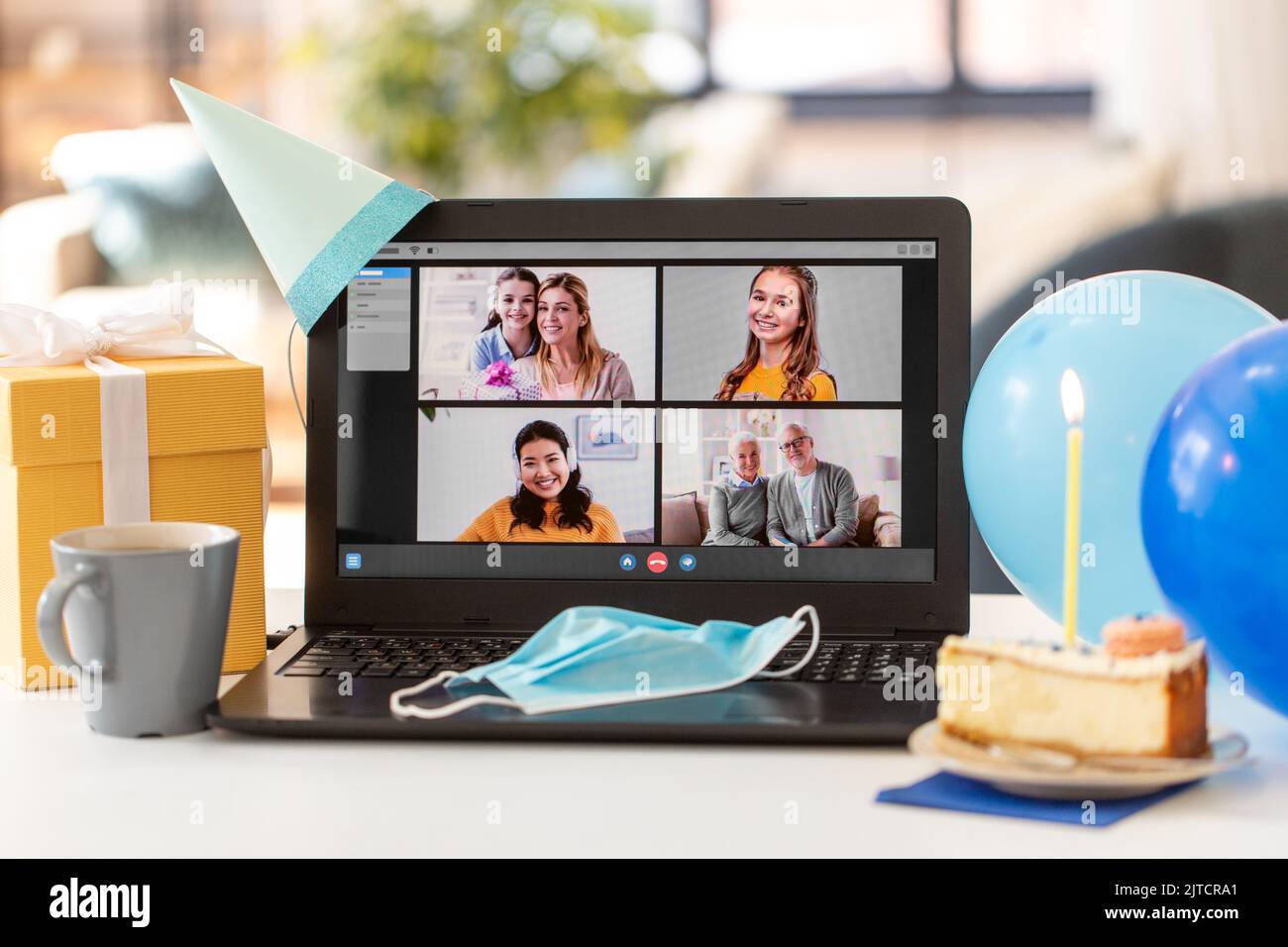 laptop with video call or online birthday party Stock Photo - Alamy