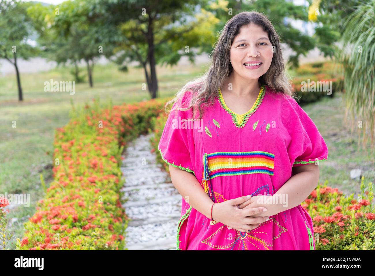 Indigenous woman in traditional dress at the park Stock Photo - Alamy
