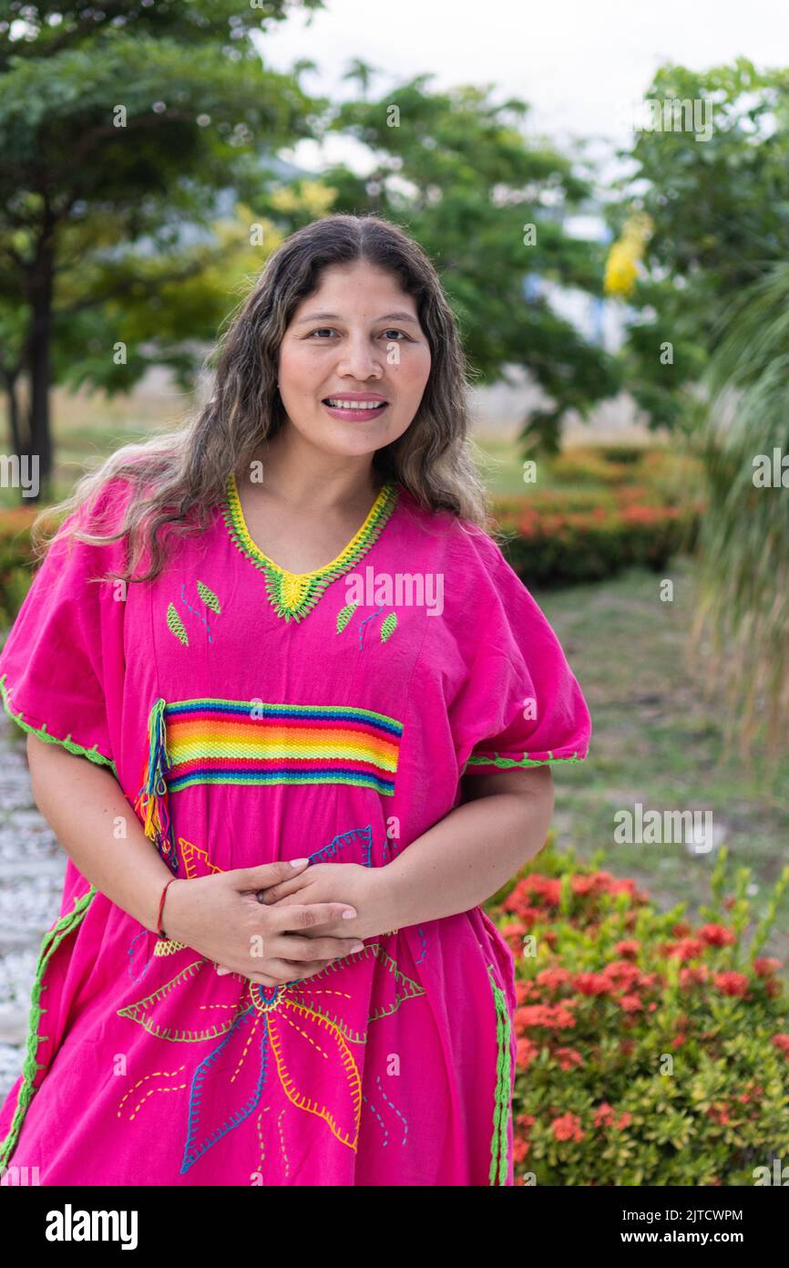 Portrait of Indigenous woman in traditional costume in the park Stock ...