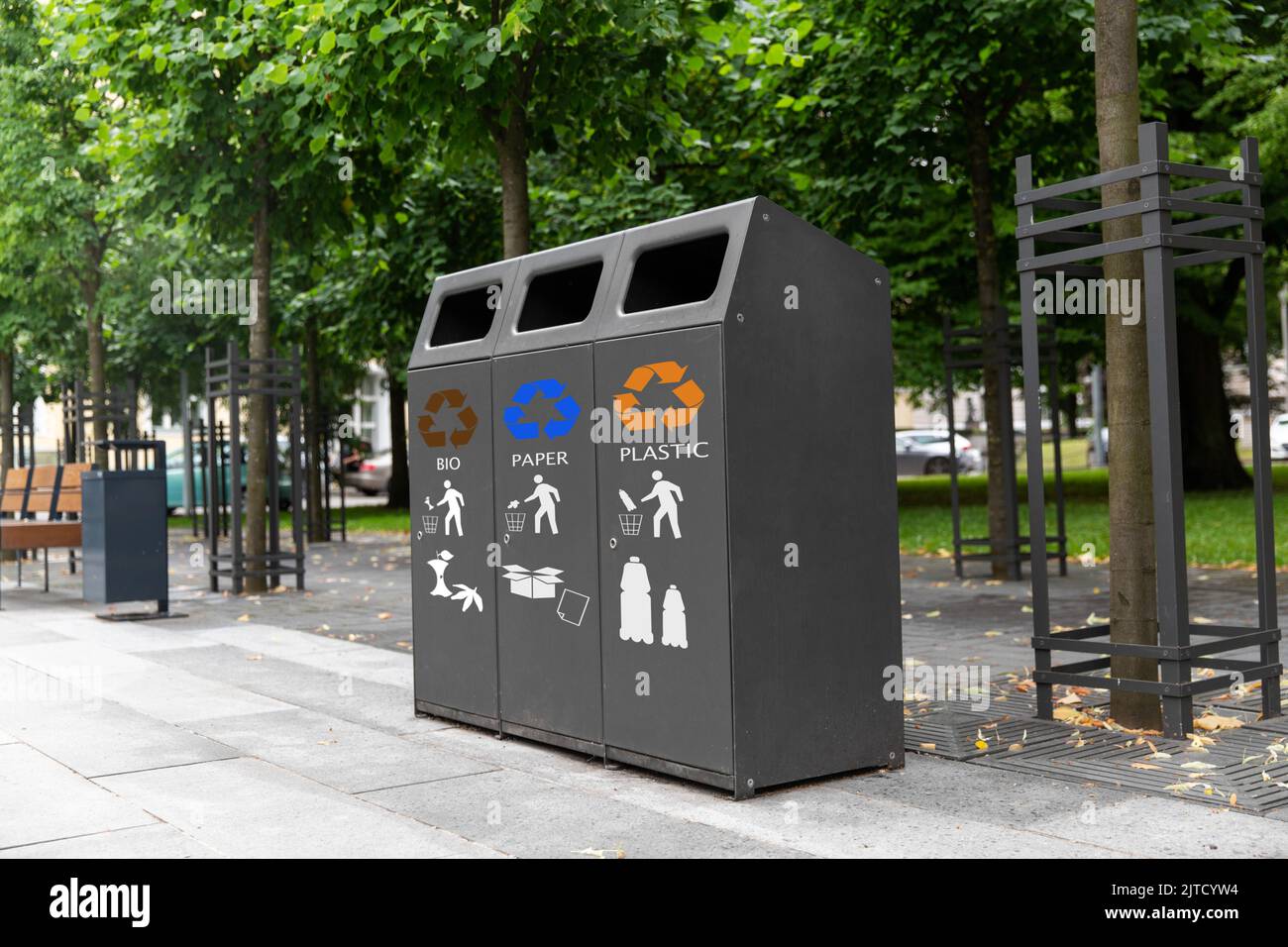 trash container for waste sorting on city street Stock Photo - Alamy