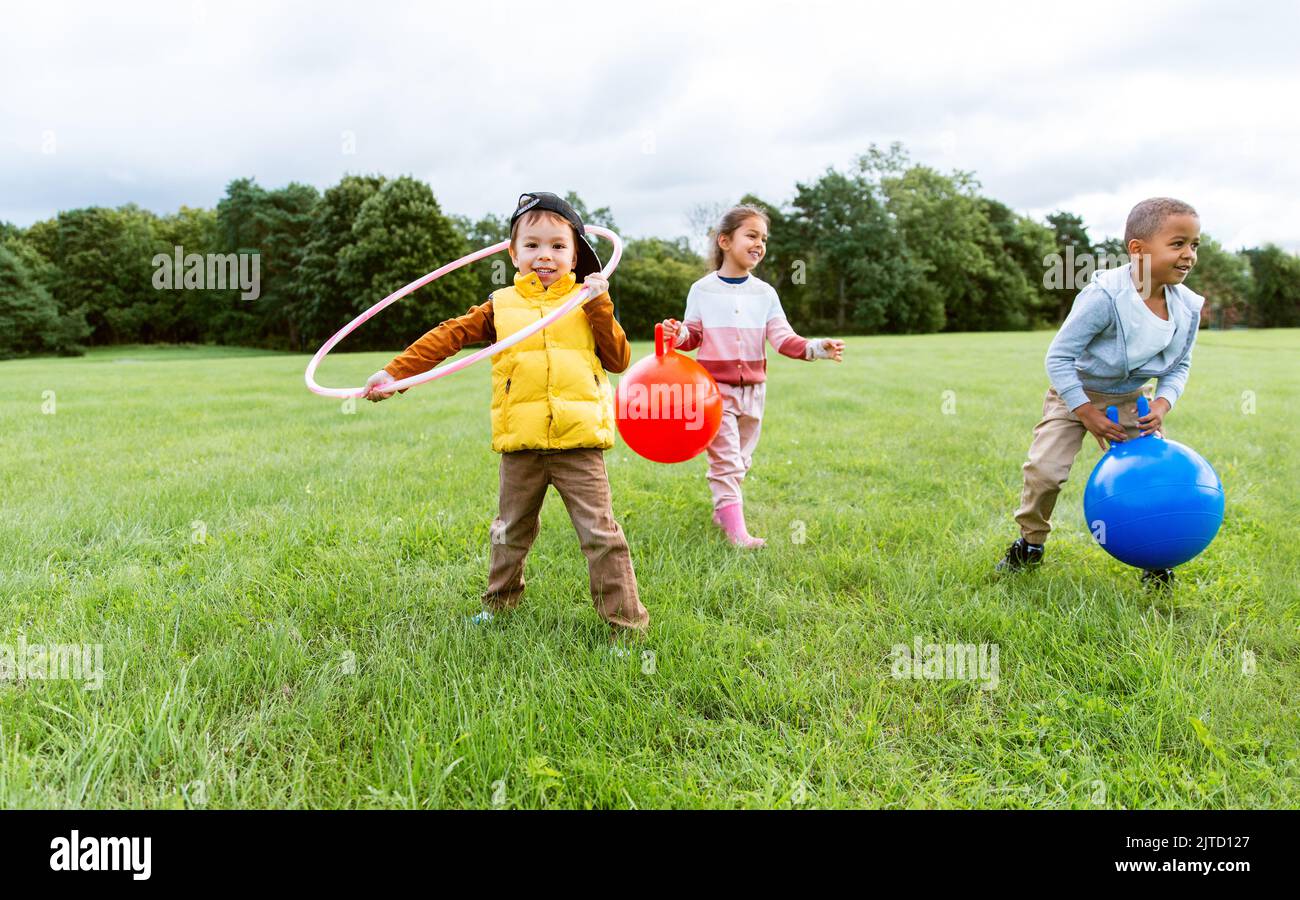 Happy kid hula hoop african american hi-res stock photography and ...