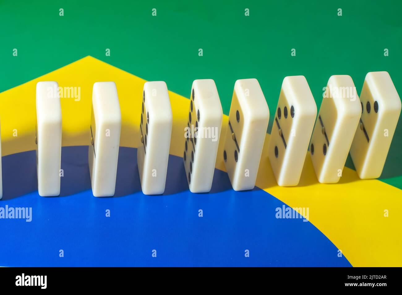 Domino game on top of a yellow and blue green flag,Brazilian colors ...