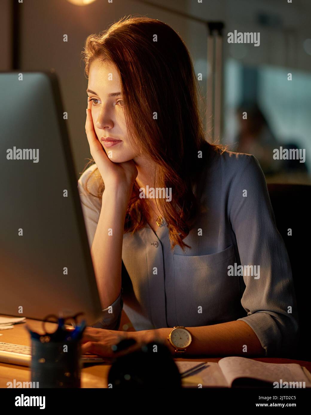 Shes focused on finishing on time. an attractive young businesswoman ...