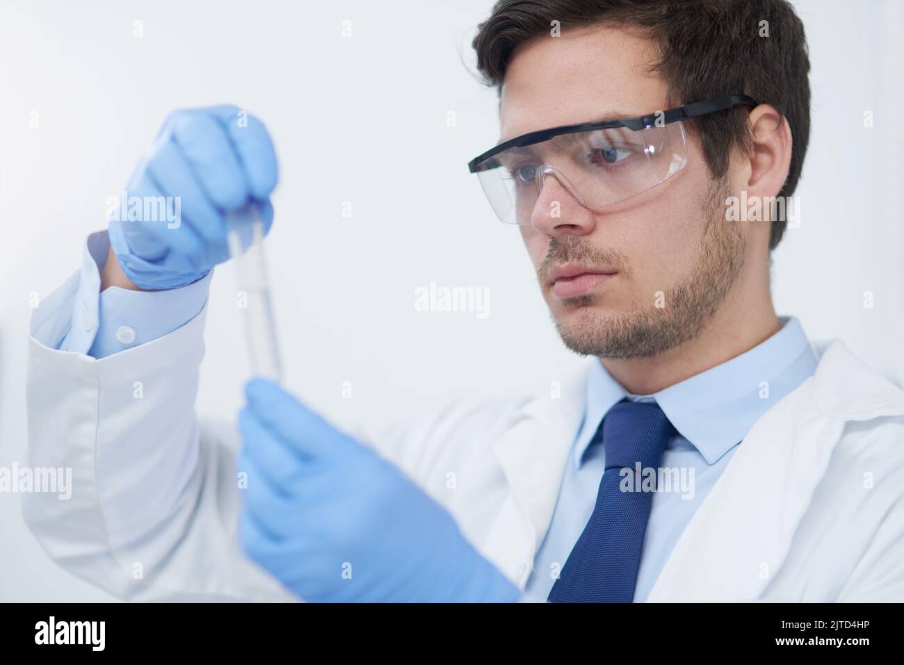 Identifying microorganisms that are causing infection. a young male ...