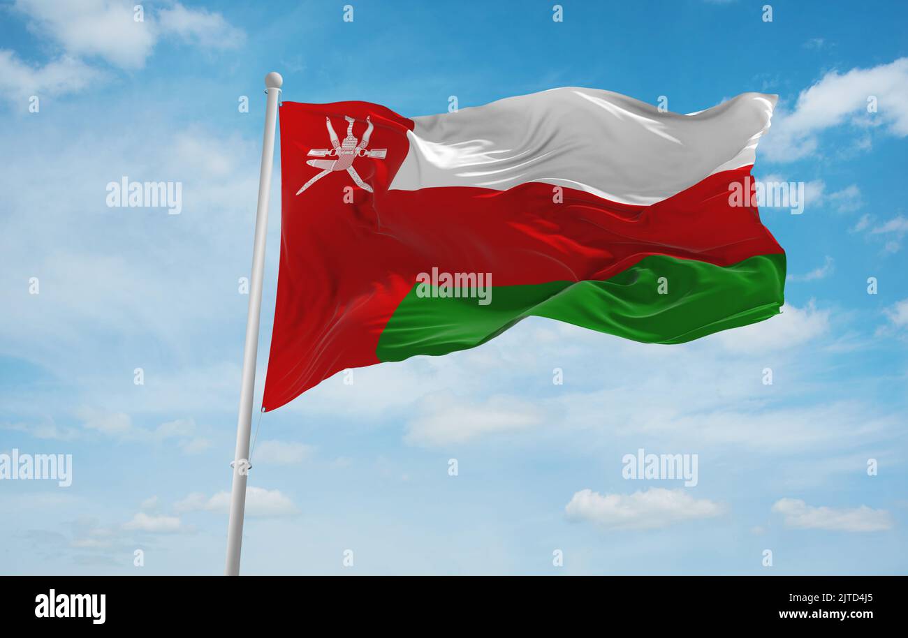 flag of Arab peoples Omanis at cloudy sky background, panoramic view ...