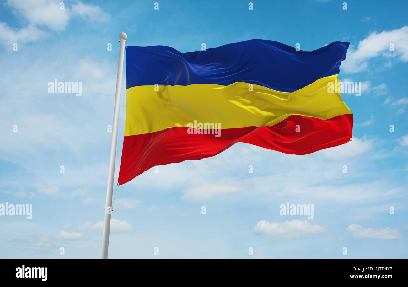 flag of Austroasiatic peoples Khmer Krom at cloudy sky background ...