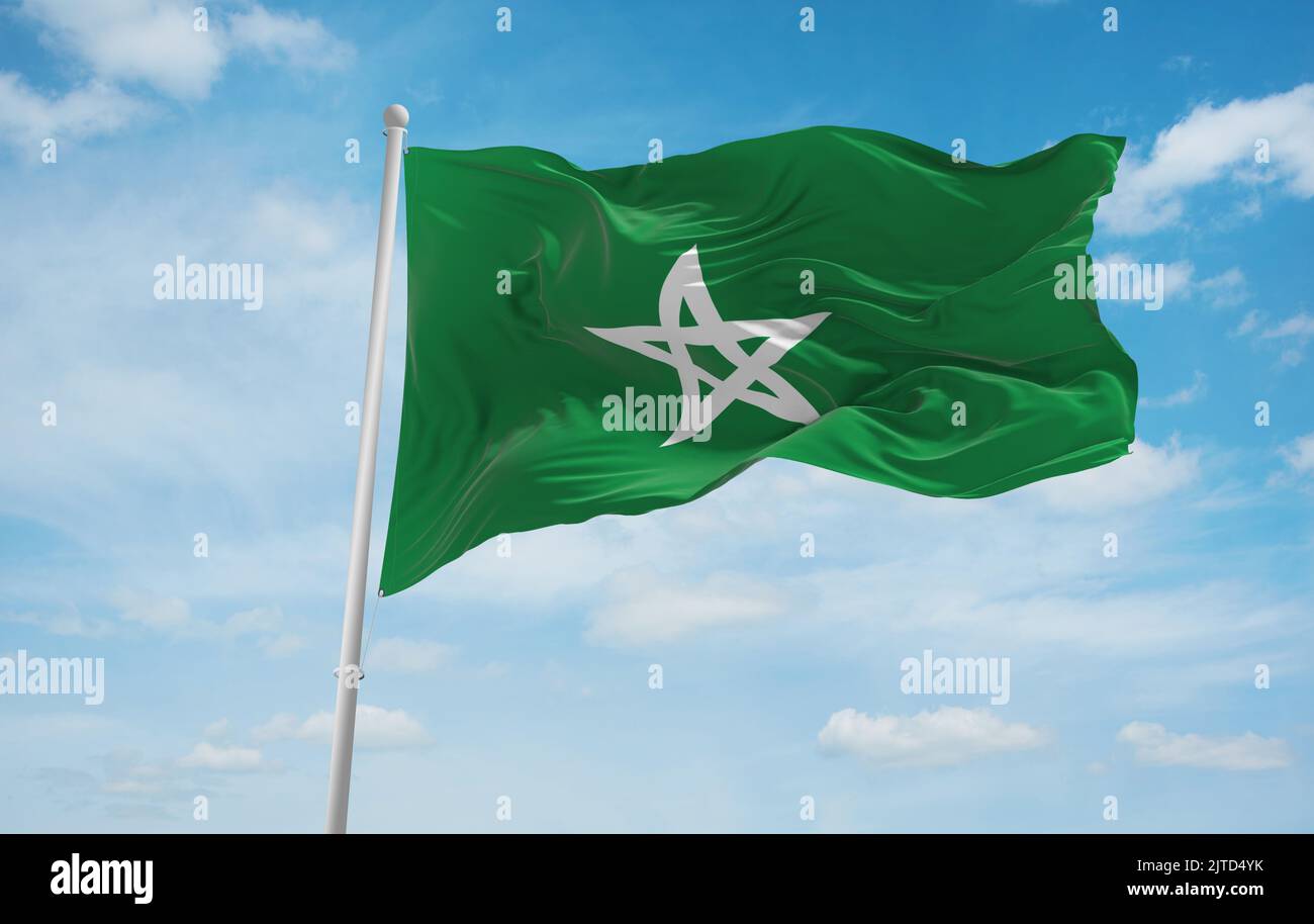 flag of Austroasiatic peoples Muong people at cloudy sky background ...