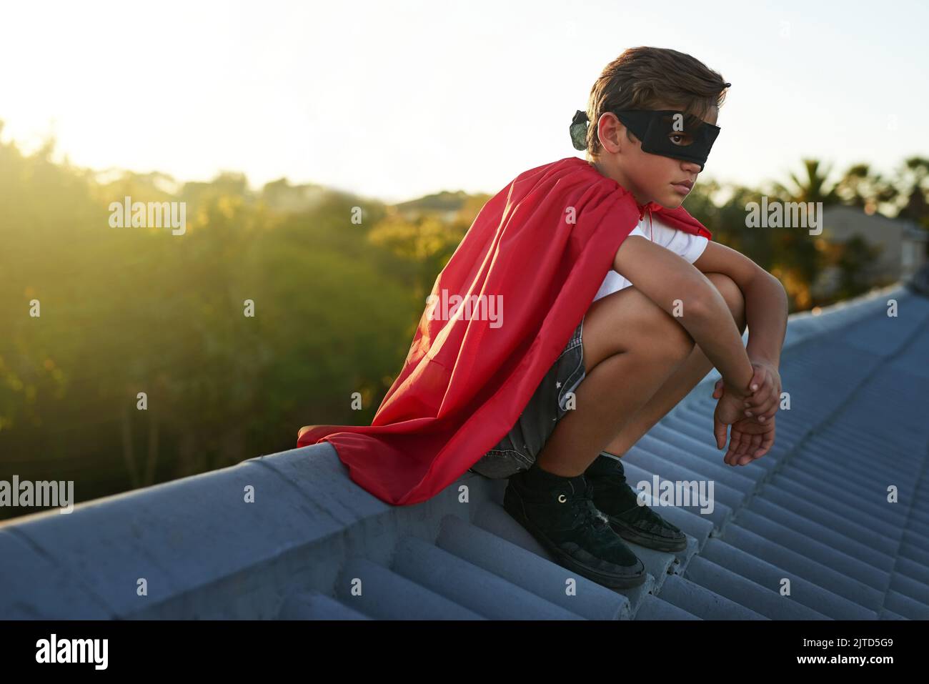 Crime never sleeps and neither does he. a young boy in a cape and mask ...