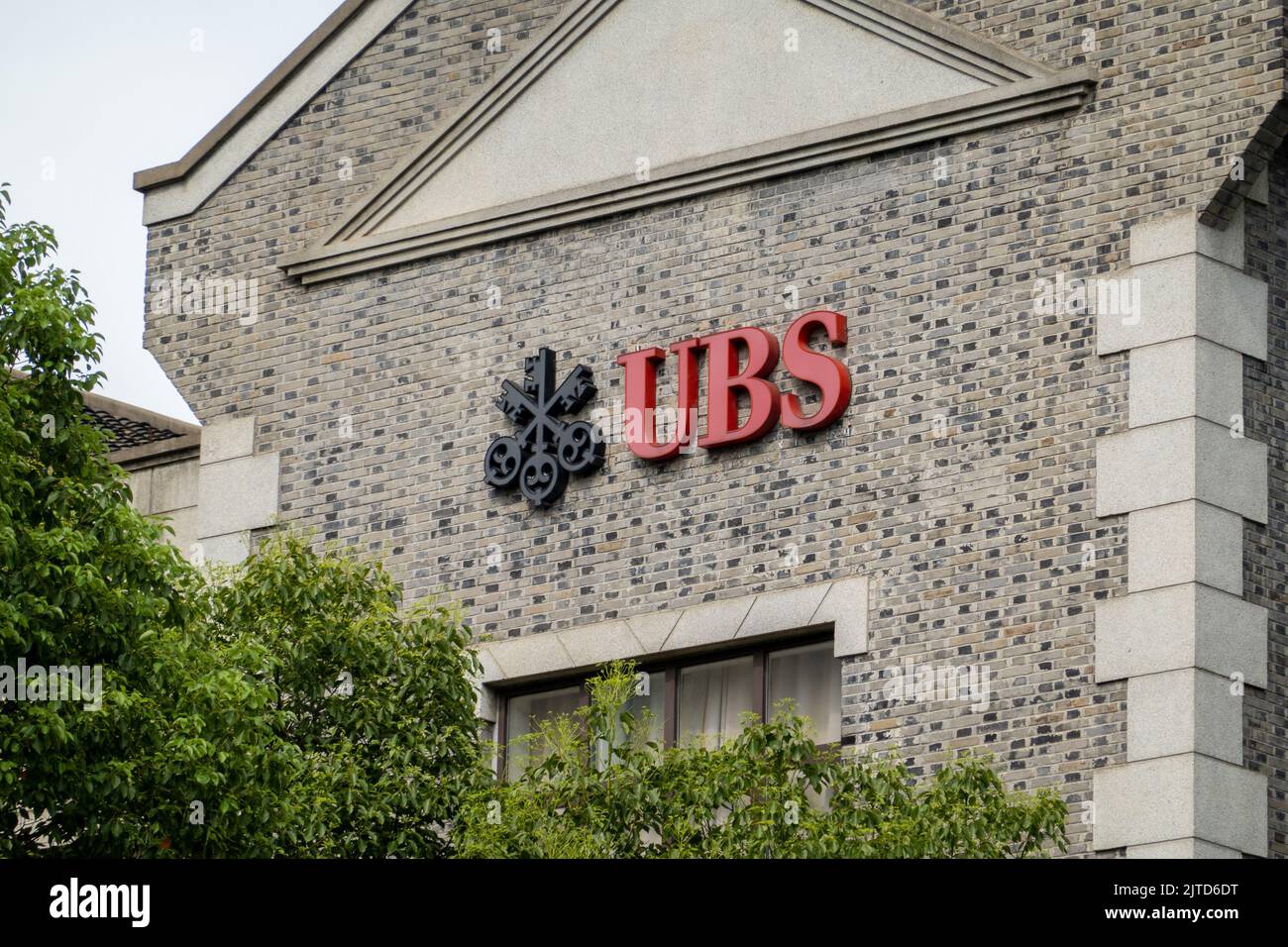 SHANGHAI, CHINA - AUGUST 29, 2022 - A UBS Swiss banking group branch is ...