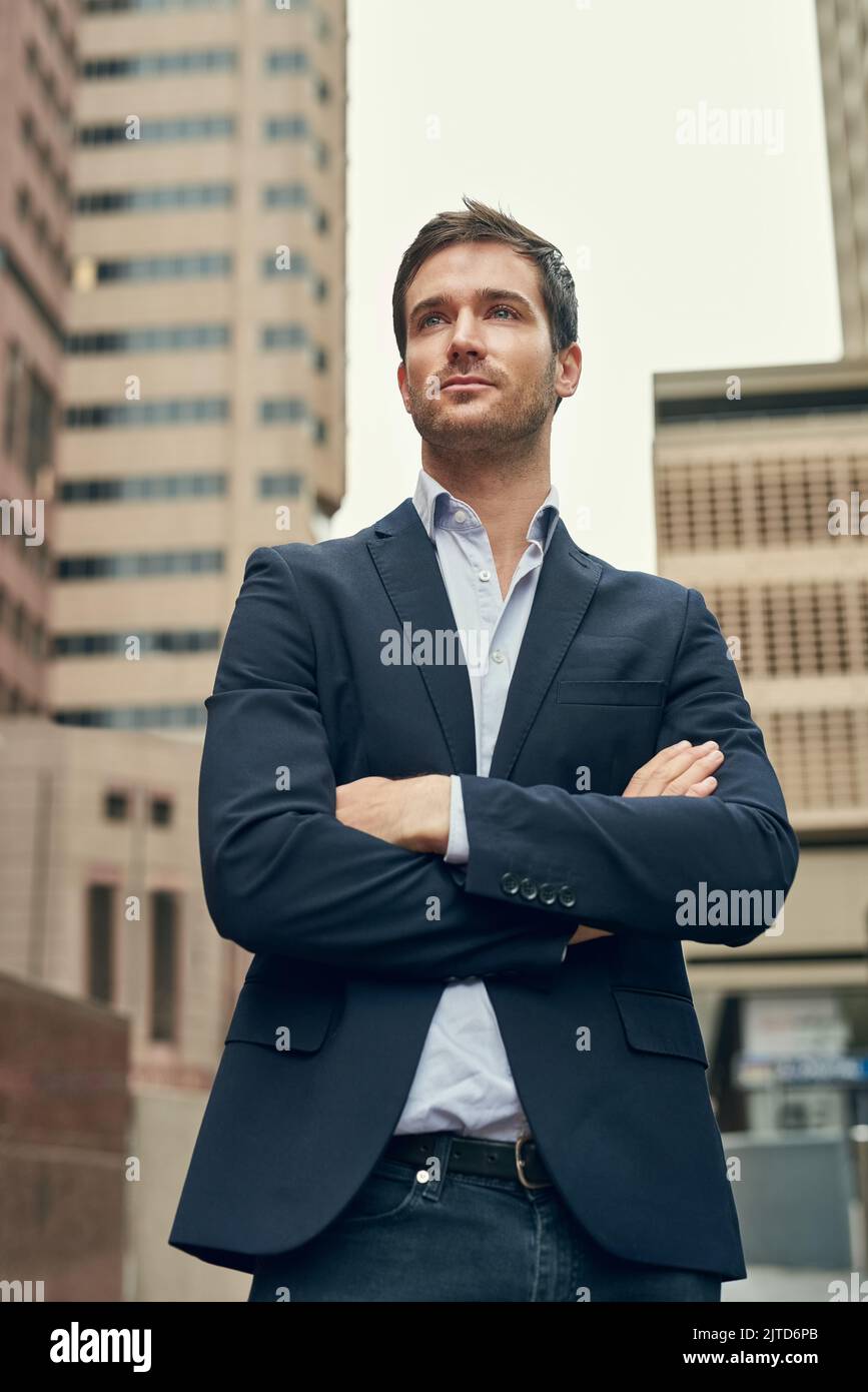 Tall young businessman standing in hi-res stock photography and images ...