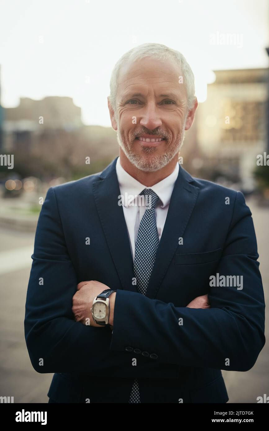 Attitude is everything. Portrait of a confident businessman standing in ...